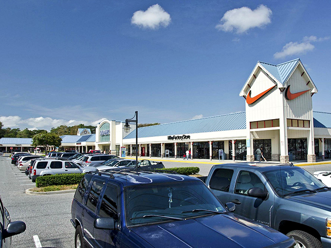 The iconic swoosh beckons like a retail lighthouse. Nike's outlet store promises athletic gear without the athletic-sized price tags.