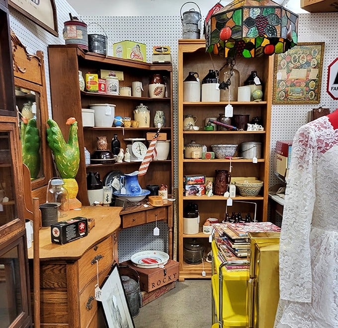 Pottery paradise for the discerning collector. From rustic crocks to delicate teacups, these shelves hold generations of craftsmanship and Sunday dinner memories.