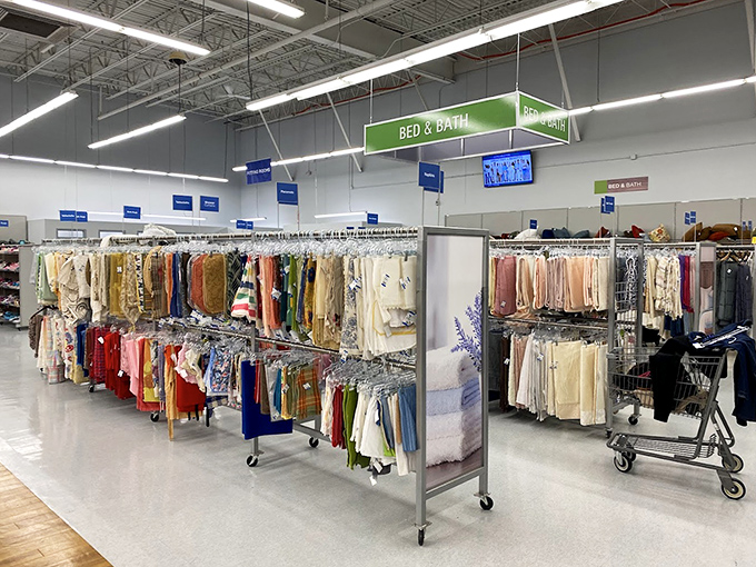Organized chaos never looked so good. The clothing section's rainbow of options proves one shopper's castoffs become another's fashion statement.