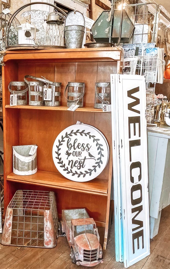 Farmhouse chic meets nostalgic comfort in this display. That "Bless Our Nest" sign would make even Martha Stewart nod in approval.
