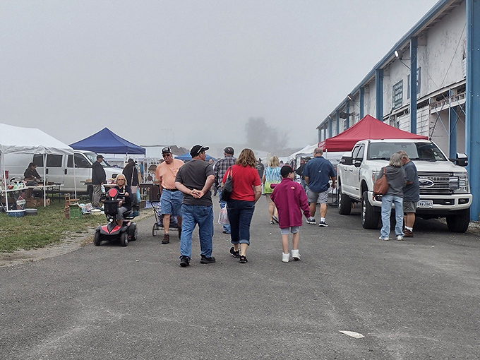 Weekend warriors navigate the bustling outdoor market, where families and bargain hunters converge in the timeless dance of discovery.