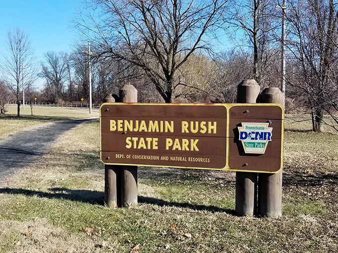 The unassuming entrance sign belies the natural wonderland waiting beyond &ndash; Philadelphia's only state park welcomes explorers.