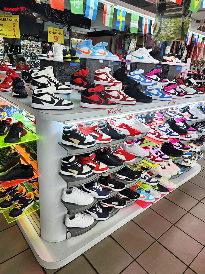 Sneakerheads, rejoice! This footwear wonderland showcases everything from classic kicks to limited editions, all beneath a canopy of international flags.