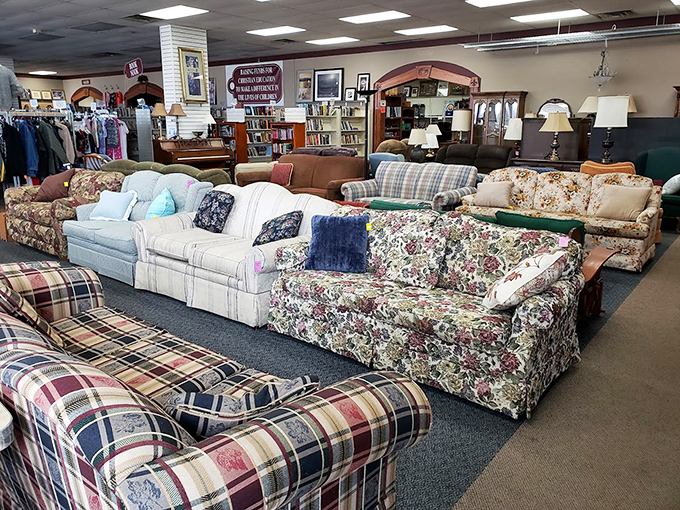 A sofa safari where floral patterns meet plaid in perfect harmony. Grandma's couch might be here, but so is your next statement piece.