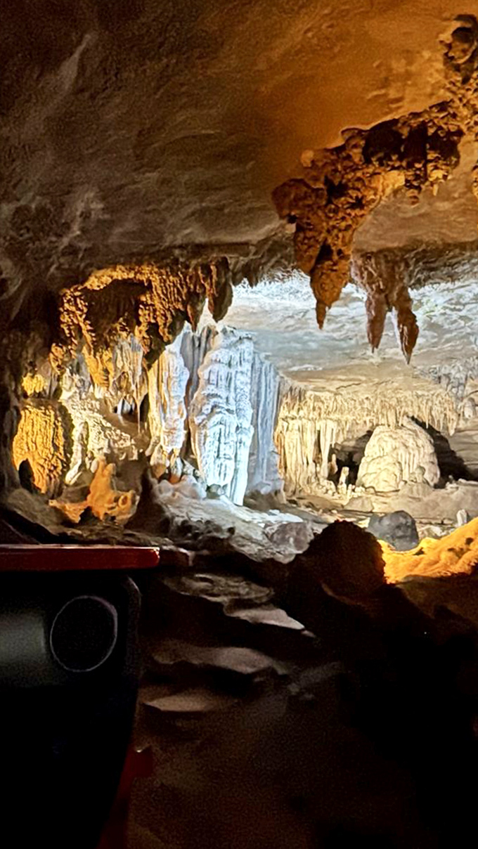Mother Nature's drippy masterpiece illuminated by strategic lighting. Like a geological Sistine Chapel, except this artist works one mineral drop at a time.