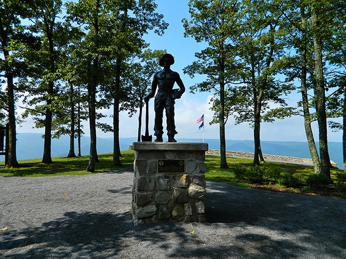 Standing sentinel over the valley, this CCC worker statue reminds us that before selfie spots, there were strong hands building America's treasures. The ultimate "view with a view."