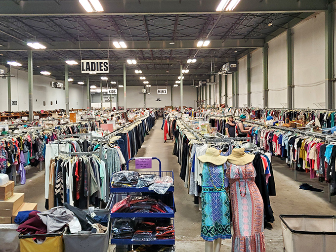 Rows of clothing stretch endlessly like a fabric rainbow, promising fashion adventures for every budget and style preference.