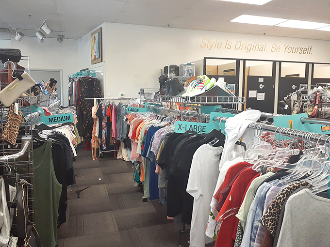 Racks organized by size make the treasure hunt efficient. No digging through fashion chaos here—just methodical browsing bliss.