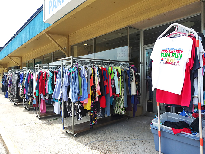 Sidewalk shopping at its finest! These rolling racks of neatly organized clothing offer the first taste of the thrifting adventure that awaits. 