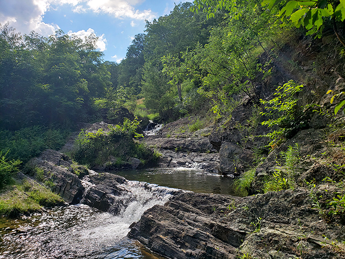Mother Nature's waterpark! These gentle cascades in Poe Valley offer the perfect soundtrack for hikers seeking tranquility.