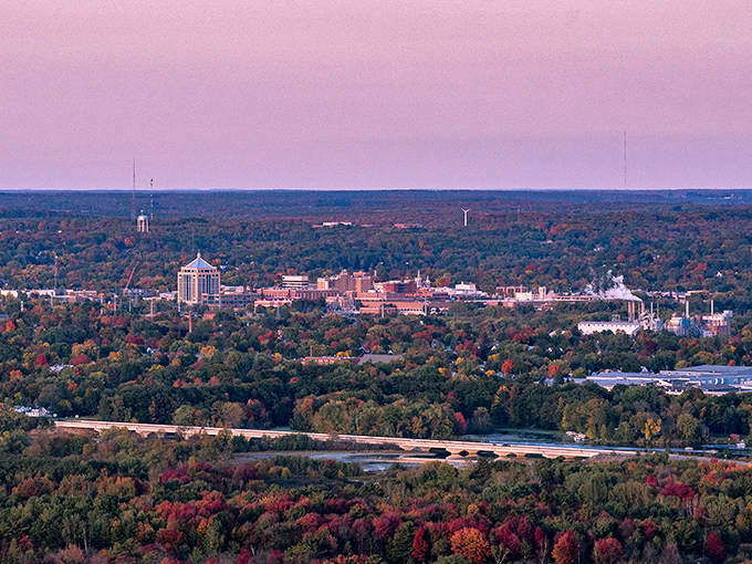 Sunset paints Wausau in cotton candy hues, revealing a city nestled in nature's embrace rather than drowning in concrete.
