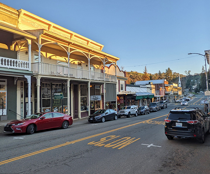 Golden hour bathes Sutter Creek's Victorian storefronts in warm light, transforming the historic buildings into a photographer's dream and antiquers' paradise.
