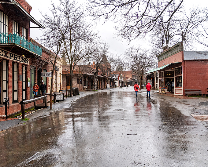 Rain-slicked streets reflect the colorful storefronts like a historical mirror, making even a drizzly day in Columbia feel like you've wandered onto a movie set.