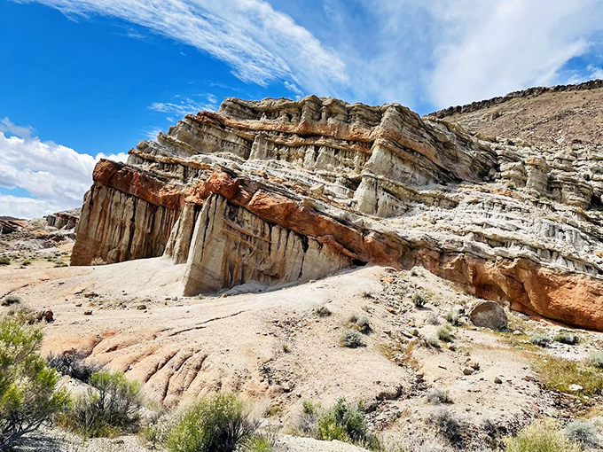 Layer cake geology at its finest. Mother Nature really took her time with this masterpiece, creating a desert landscape that would make any artist jealous.