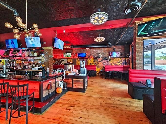 Red lights and exposed brick create an atmosphere where Dracula would happily order a burger.