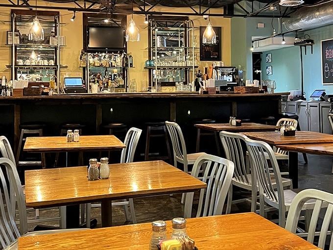 Industrial chic meets Southern comfort in this perfectly appointed dining room where every table promises culinary adventure.