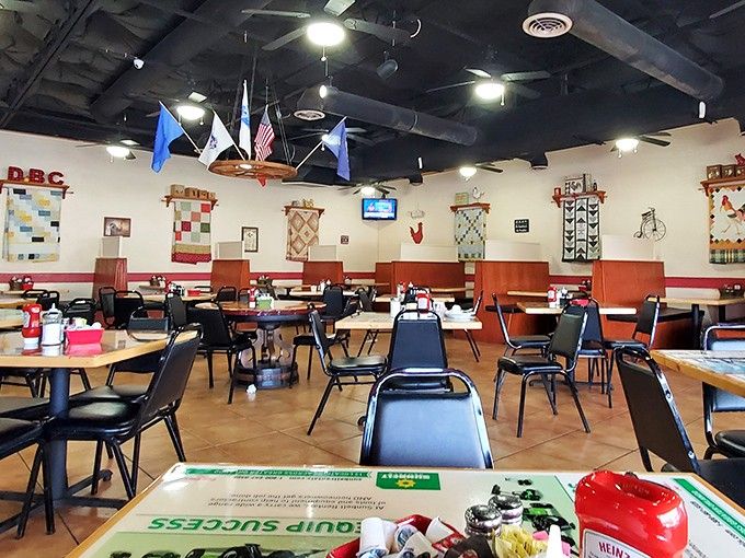 Quilts and flags create an atmosphere where every meal feels like Sunday dinner at grandma's house.