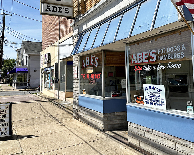 Blue-trimmed nostalgia in brick and mortar form. Step inside this time capsule where hot dogs remain blissfully unchanged by food trends.