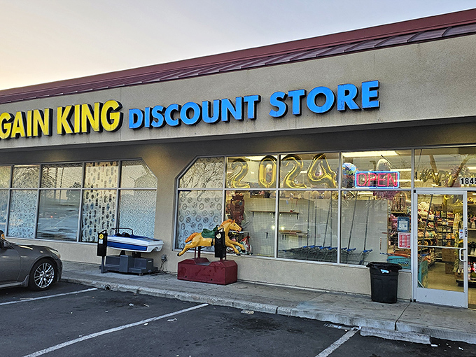 Bargain King's bright yellow sign rules over this shopping kingdom. Even the golden horse statue seems to approve!