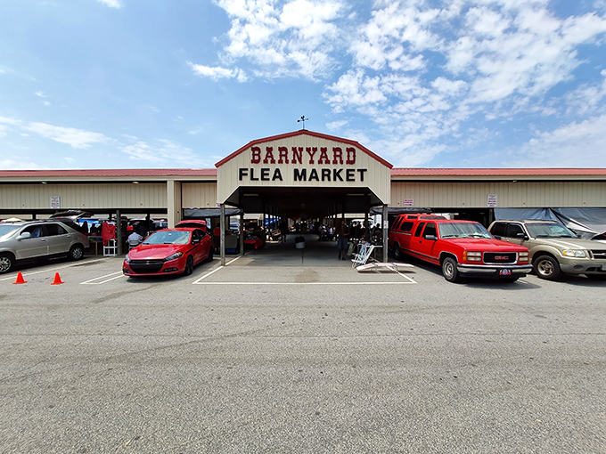 The barn-red entrance beckons like retail therapy's pearly gates. Barnyard Flea Market promises adventures in every aisle.