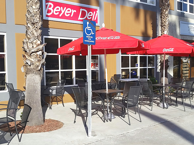Beyer Deli's outdoor seating area &ndash; where sandwiches taste even better under those cheerful red umbrellas and California sunshine.
