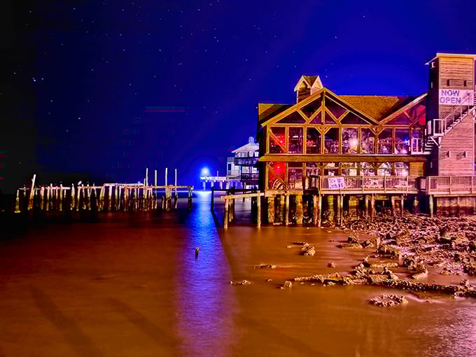 Cedar Key's weathered pier stretches into the Gulf like a wooden bridge to yesterday's simpler times.
