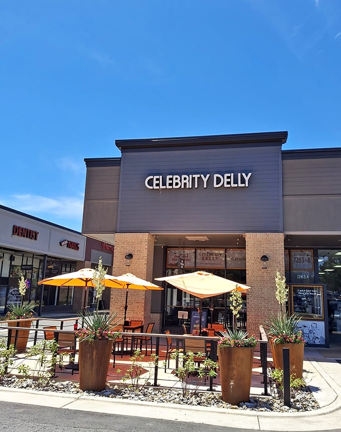 Celebrity Delly's modern storefront and orange umbrellas create the perfect spot for people-watching while sandwich-eating.