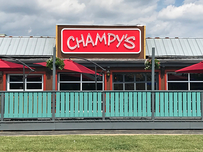 Champy's turquoise fence and casual vibe scream "good times ahead!" Like finding a beach party in the middle of Tennessee.
