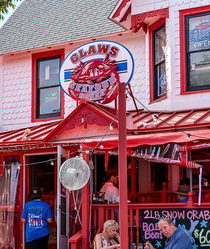 Red as a lobster's shell, this vibrant seafood house practically shouts "come get messy with us!"