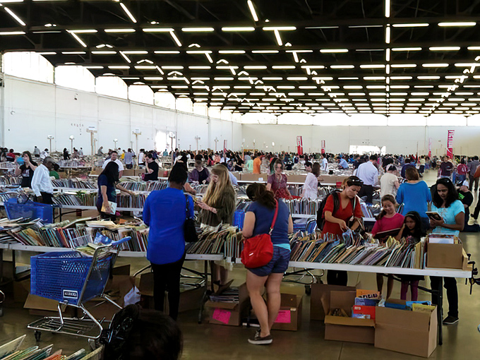 Books stretch endlessly like a literary buffet where knowledge costs less than your morning coffee.