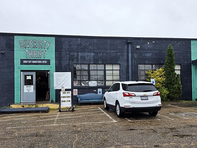 That bold teal and black facade isn't just eye-catching – it's practically shouting "come discover something amazing inside!"