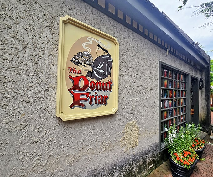 The Donut Friar's medieval-style sign hints at the magical treats within this Gatlinburg hideaway.