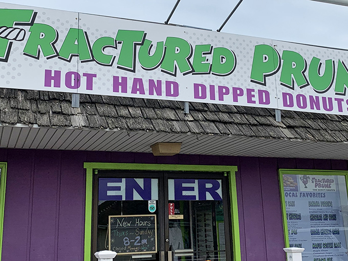 Fractured Prune's purple palace stands ready to grant your wildest donut dreams, one hot-dipped creation at a time.