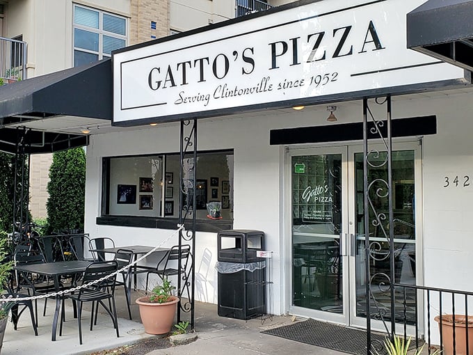 Gatto's elegant storefront announces its pizza legacy since 1952. Simple, classic, and promising deliciousness behind those doors.