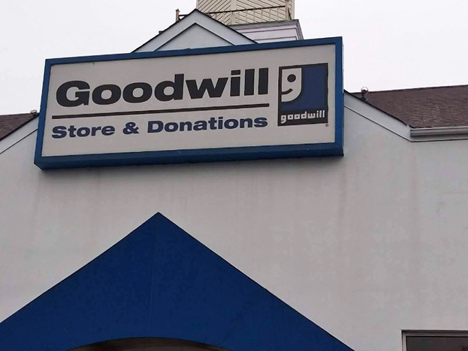 The classic Goodwill blue never looked so inviting - your treasure hunt headquarters awaits inside those doors.