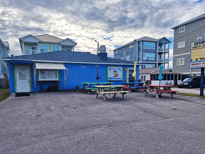 This cheerful blue cottage proves that the best beach eats often hide in plain sight.