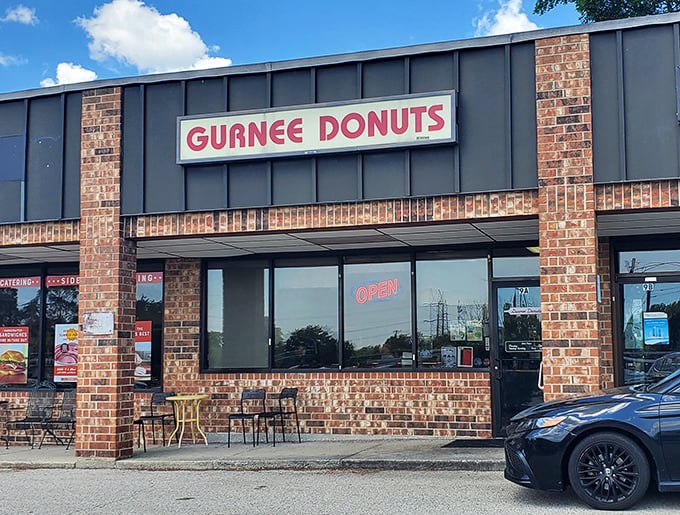Classic brick and bold signage announce Gurnee Donuts' no-nonsense approach to donut perfection. Sometimes the best treasures hide in plain sight.