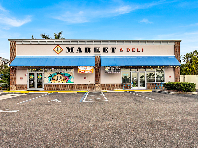 Brick and blue awnings create the perfect backdrop for serious sandwich craftsmanship and neighborhood charm.