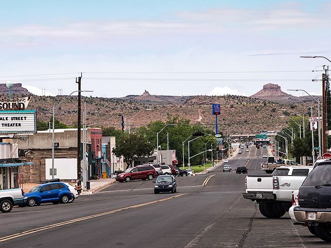 Kingman's main street stretches toward distant mountains, where Route 66 dreams meet budget-friendly reality in perfect harmony. 