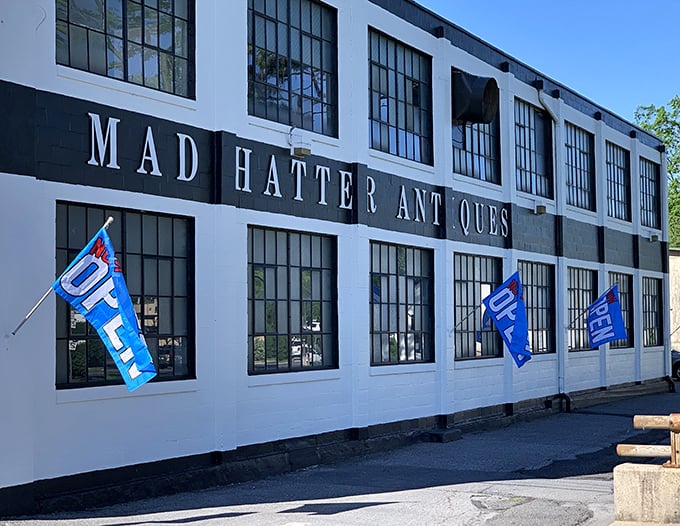 Mad Hatter Antiques lives up to its whimsical name with this perfectly charming industrial building facade.
