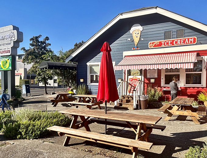 That cheerful blue and red exterior promises the kind of hearty breakfast that fuels great adventures ahead.