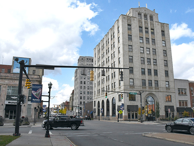 Mansfield's towering buildings reach skyward like ambitious dreams made of stone and determination.