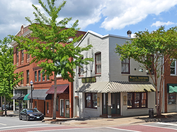 Martinsville's main drag: where awnings dance in the breeze and brick buildings stand shoulder-to-shoulder like old friends at a reunion.