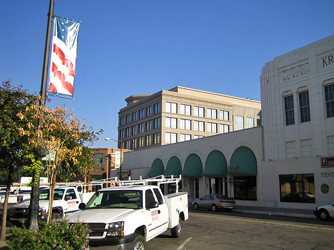 Modesto's downtown hums with small-town energy under that impossibly blue California sky&mdash;where work trucks and art deco create an unlikely friendship.