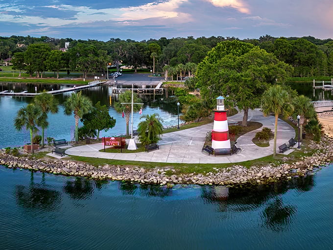Mount Dora's lighthouse stands sentinel over peaceful waters, a postcard-perfect scene without the tourist crowds.