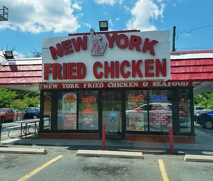 The Statue of Liberty on their sign isn't just decoration - it's a promise of freedom from boring chicken.
