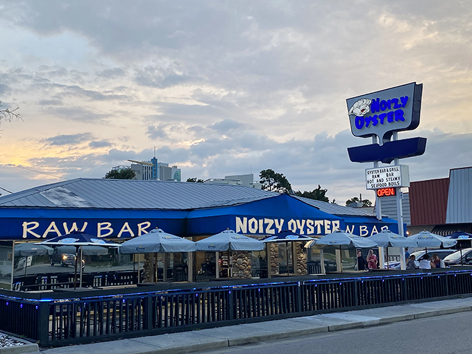 That bright blue exterior practically shouts "fresh seafood inside" louder than a fisherman's morning call.