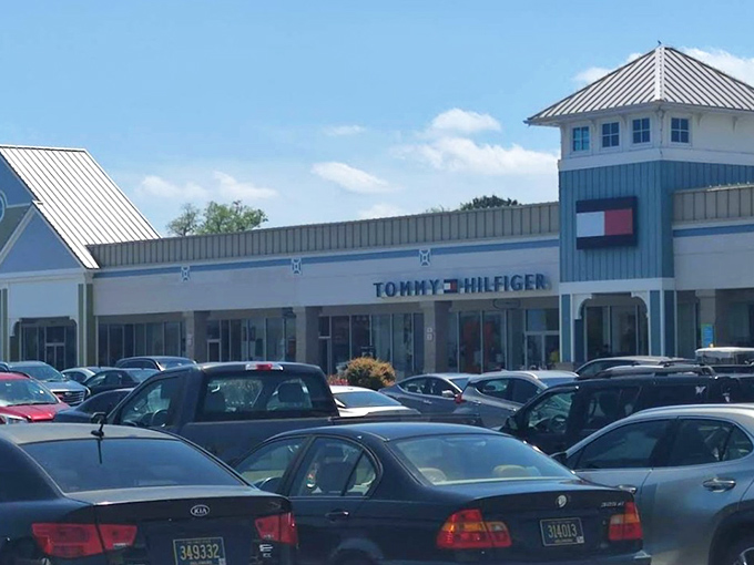 Tommy Hilfiger's outlet presence commands attention like a well-dressed general surveying his retail troops.