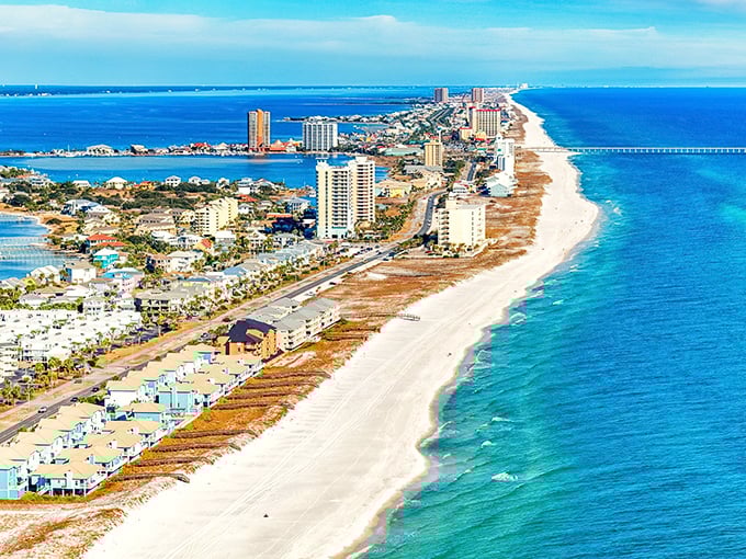 Pensacola's pristine coastline stretches like a ribbon of white between emerald waters and colorful beach homes. Mother Nature showing off again!