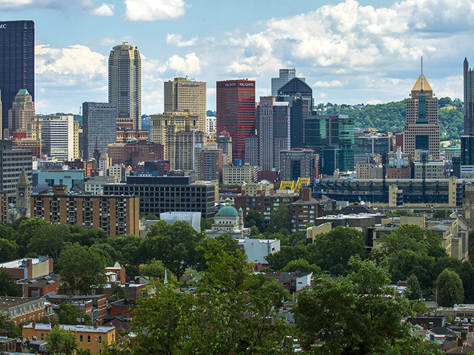 Pittsburgh's dramatic skyline rises above lush greenery—where else can you find this much urban beauty with homes under $250K?